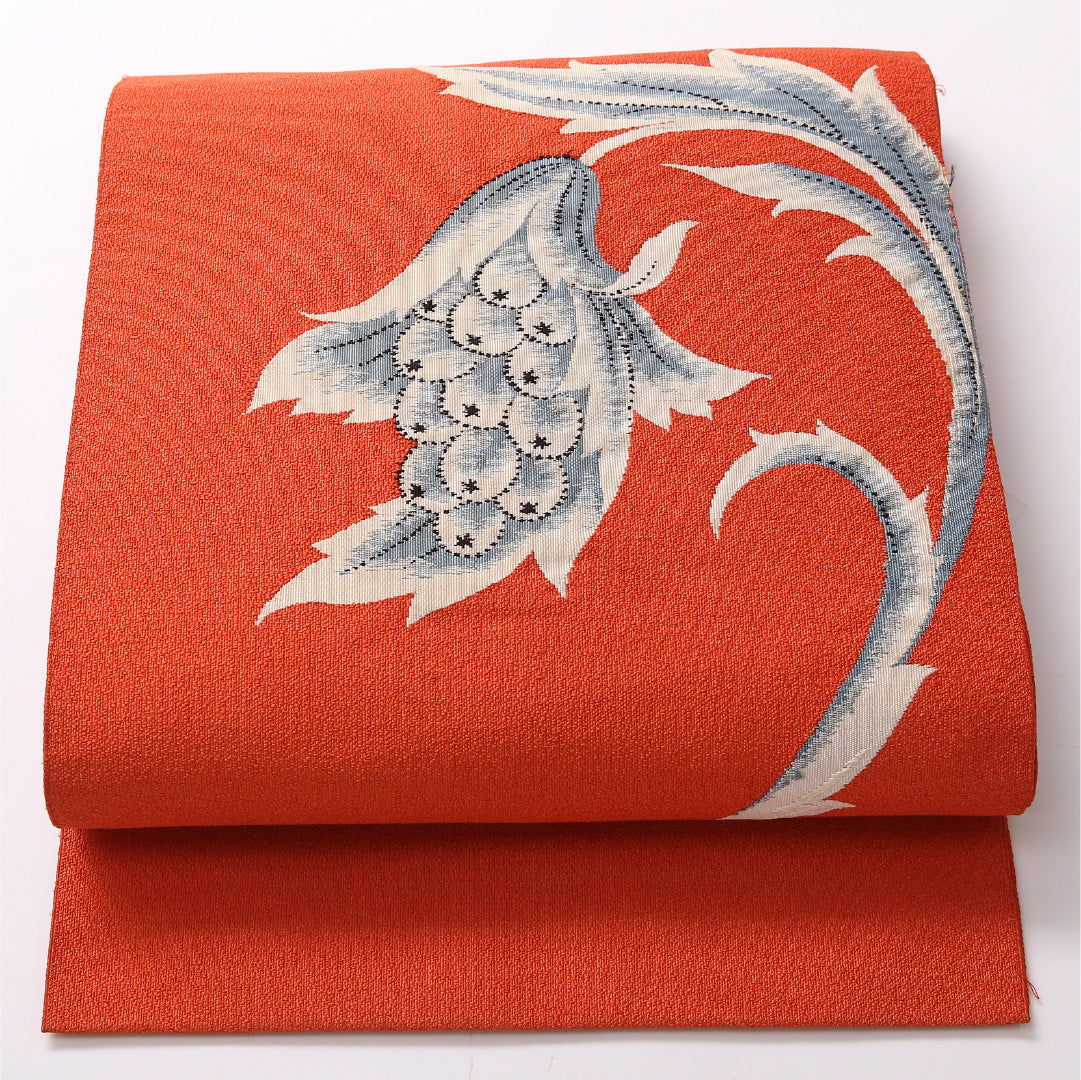 【中古・リサイクル 名古屋帯】 ポイント柄 帯丈340cm カジュアル Aランク 正絹 綴れ織 植物柄 朱系 1224-02835